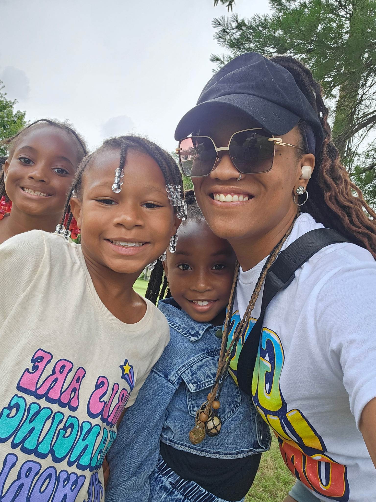 Kenisha Le'Cole with students at outdoor community event